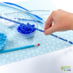 DIY Sparkly Pipe Cleaner Icicles: Winter Fine Motor Activity